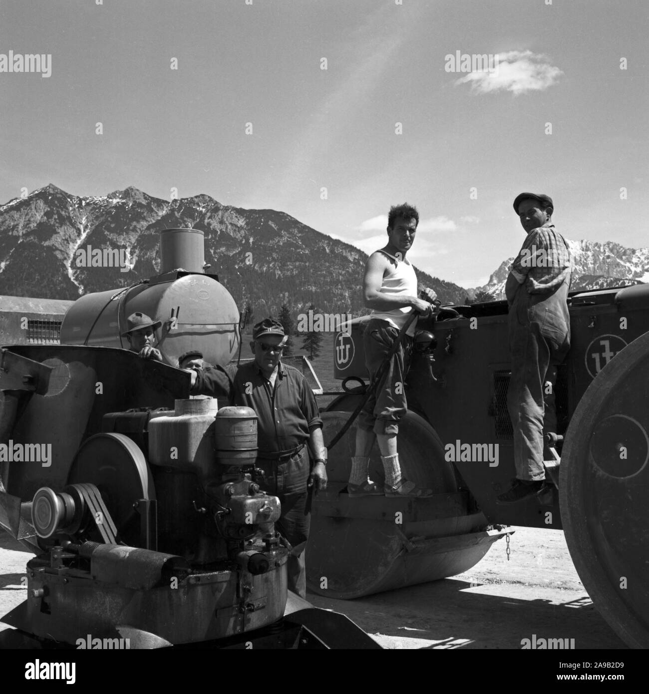 Daily work in a construction area, Germany 1950s Stock Photo - Alamy