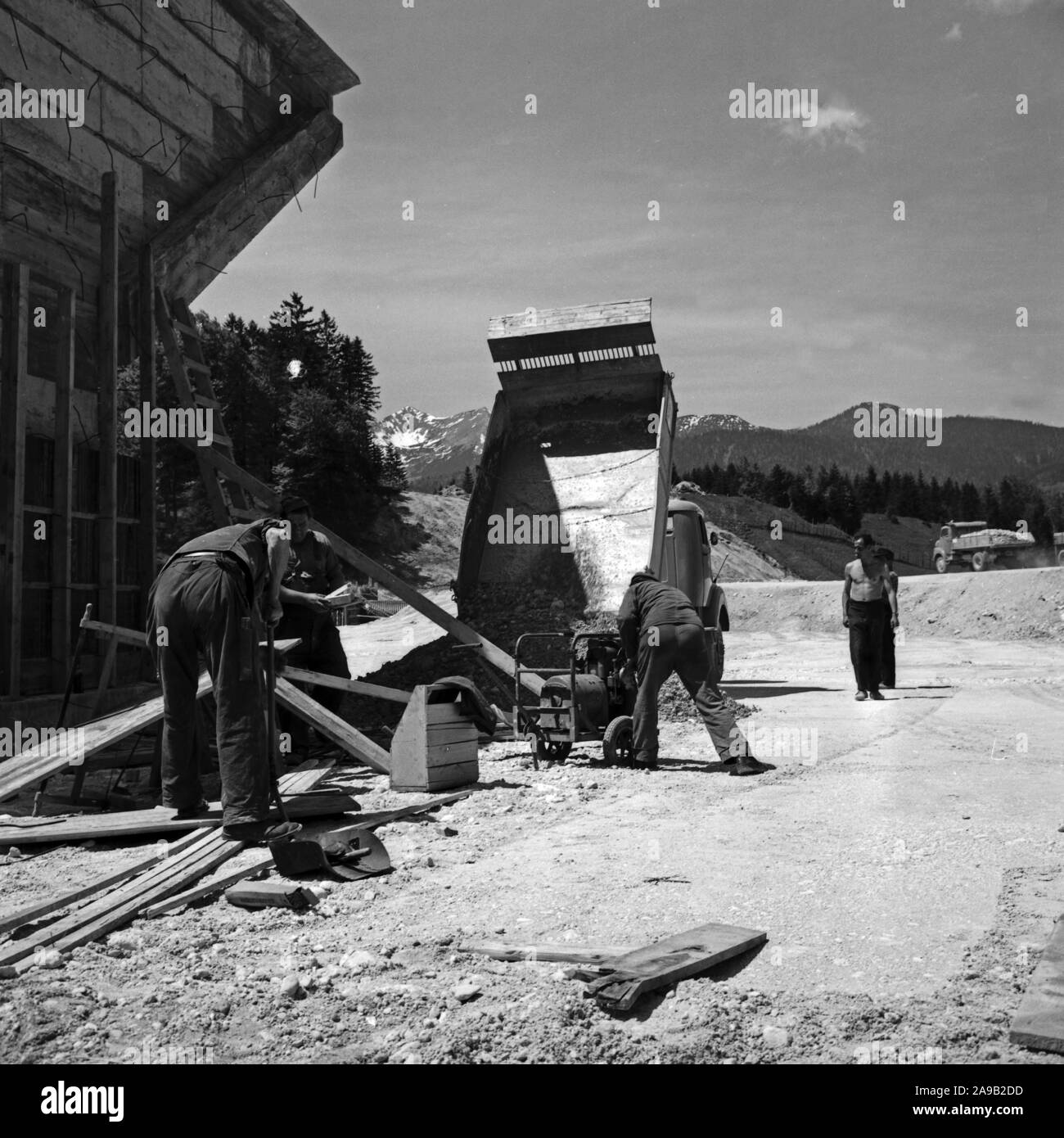 Daily work in a construction area, Germany 1950s Stock Photo - Alamy