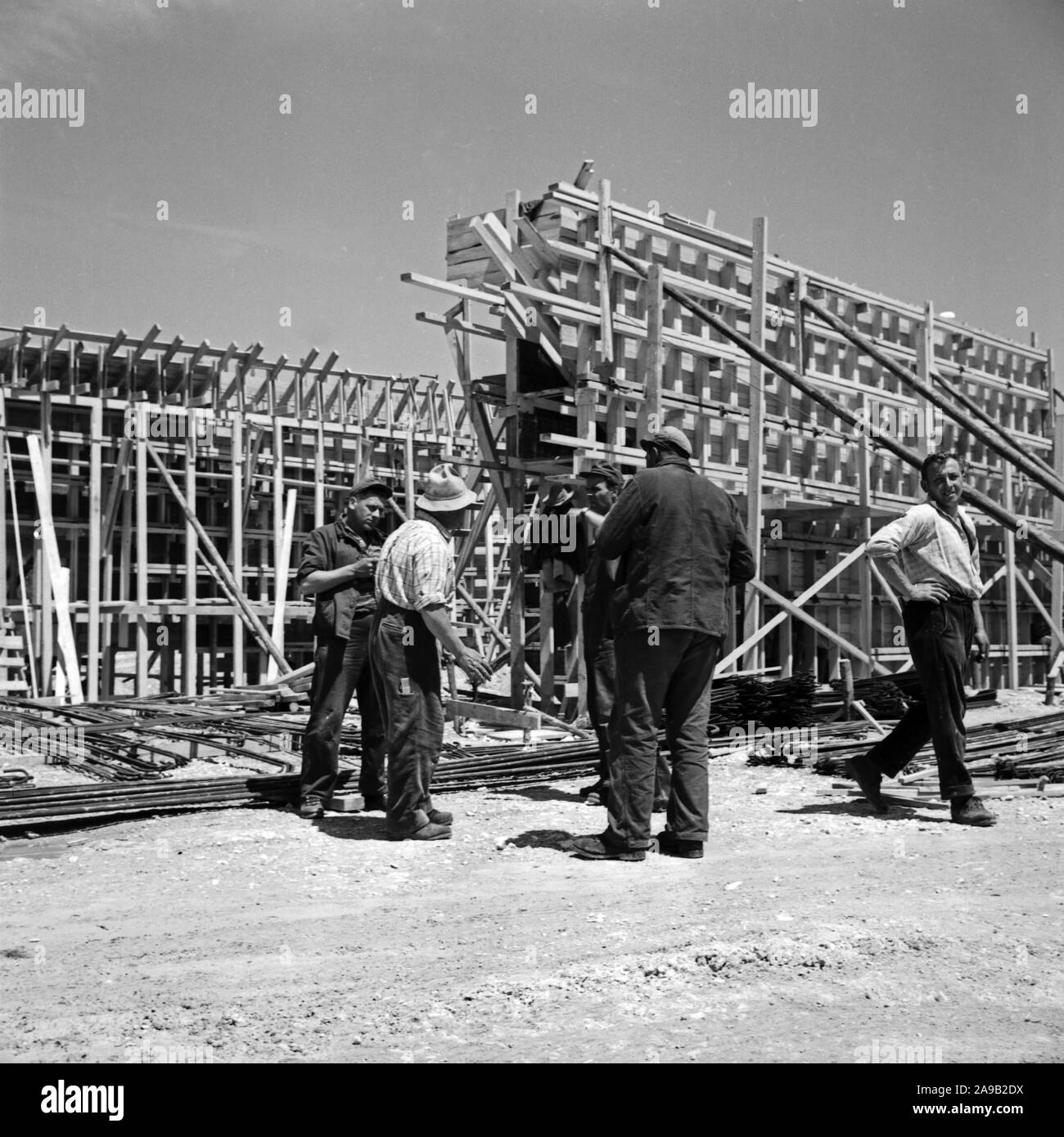 Daily work in a construction area, Germany 1950s Stock Photo - Alamy