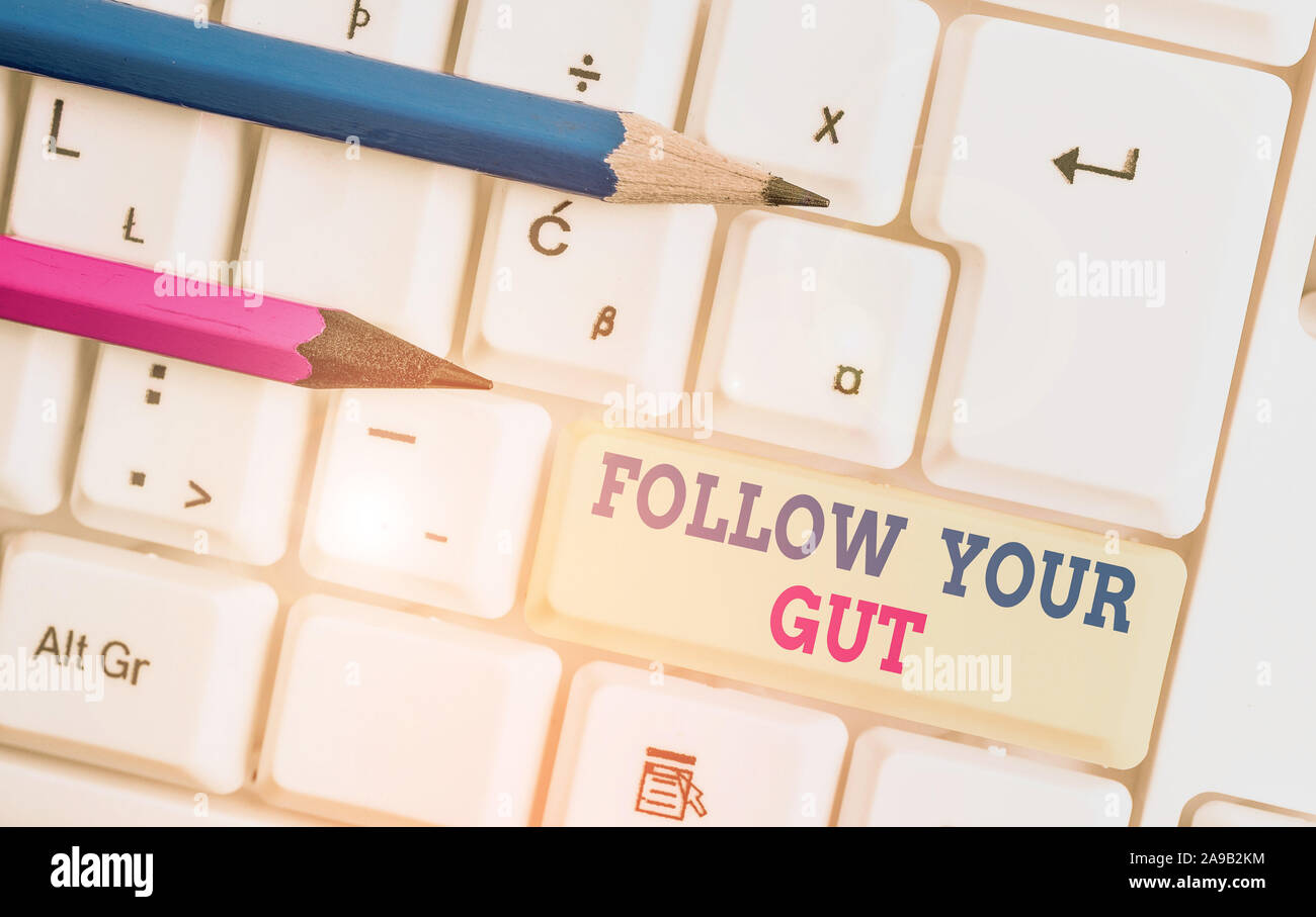 Writing note showing Follow Your Gut. Business concept for Listen to ...