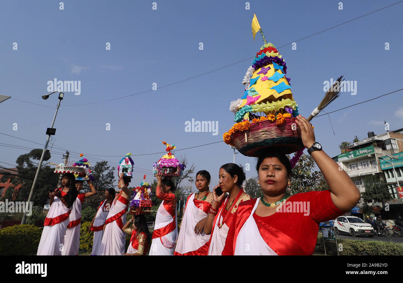Kathmandu, Nepal. 13th Nov, 2019. Nepalese ethnic Tharu community women ...