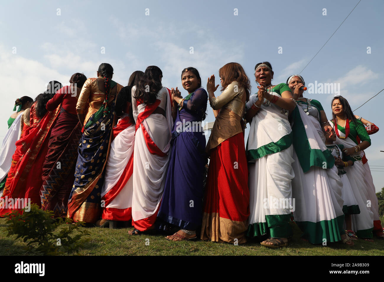 Kathmandu, Nepal. 13th Nov, 2019. Nepalese ethnic Tharu community women ...