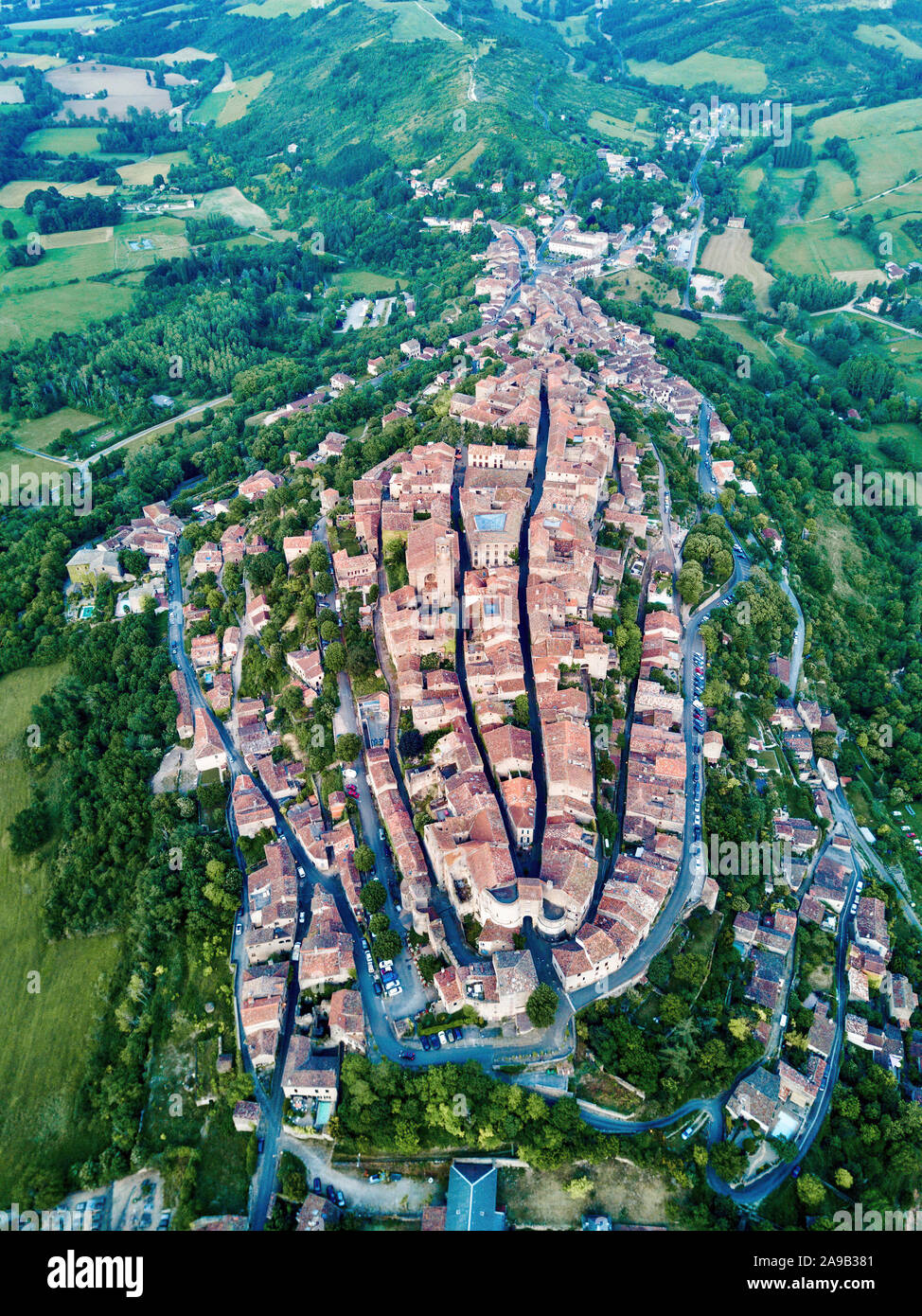 Aerial drone shot view of Corde-sur-ciel, medieval fortified town on ...