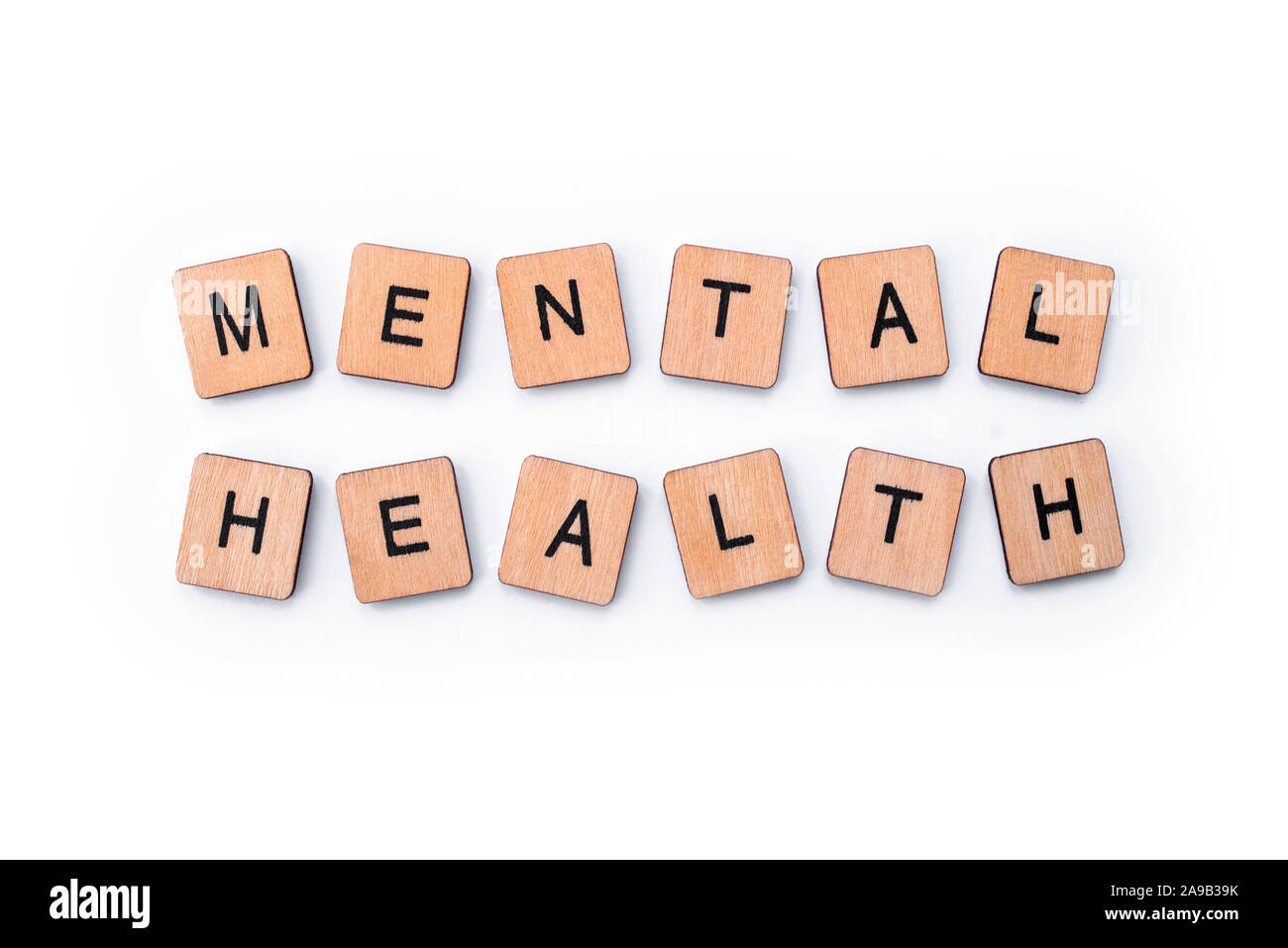 MENTAL HEALTH, spelt with wooden letter tiles Stock Photo - Alamy