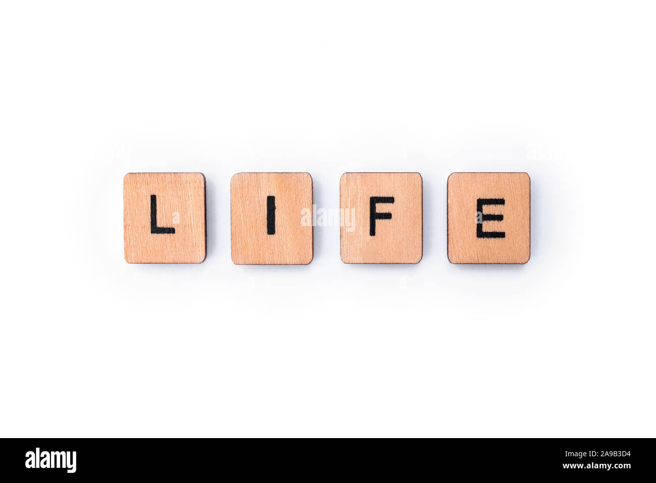 The word LIFE, spelt with wooden letter tiles Stock Photo - Alamy