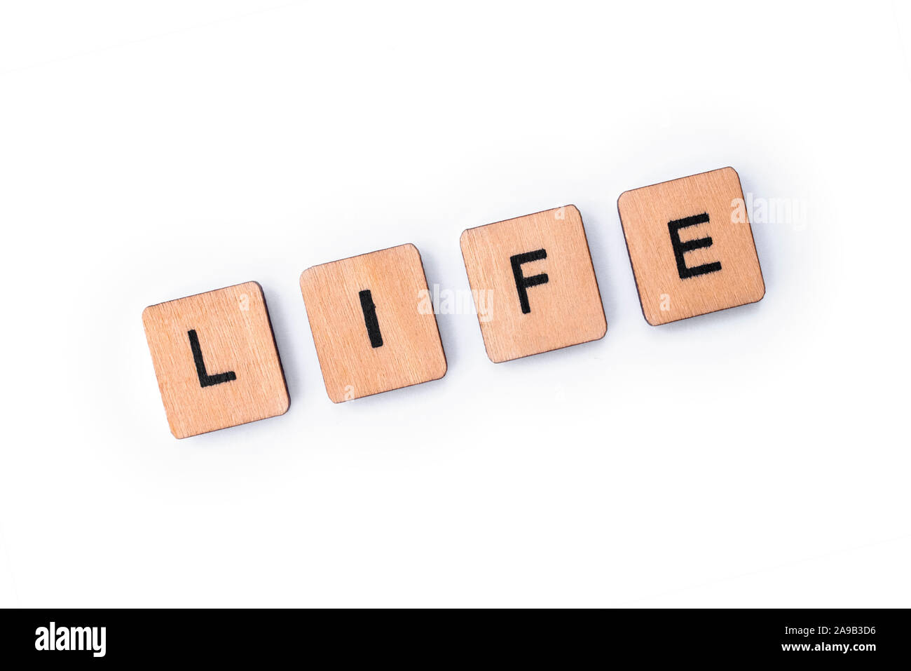 The word LIFE, spelt with wooden letter tiles Stock Photo - Alamy