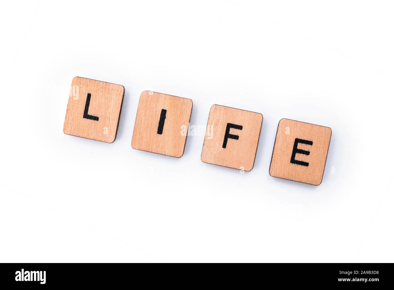 The word LIFE, spelt with wooden letter tiles Stock Photo - Alamy
