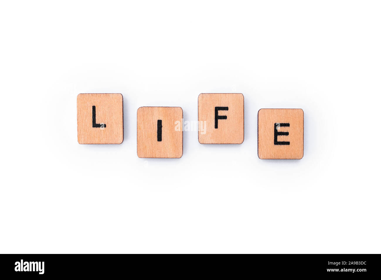 The word LIFE, spelt with wooden letter tiles Stock Photo - Alamy