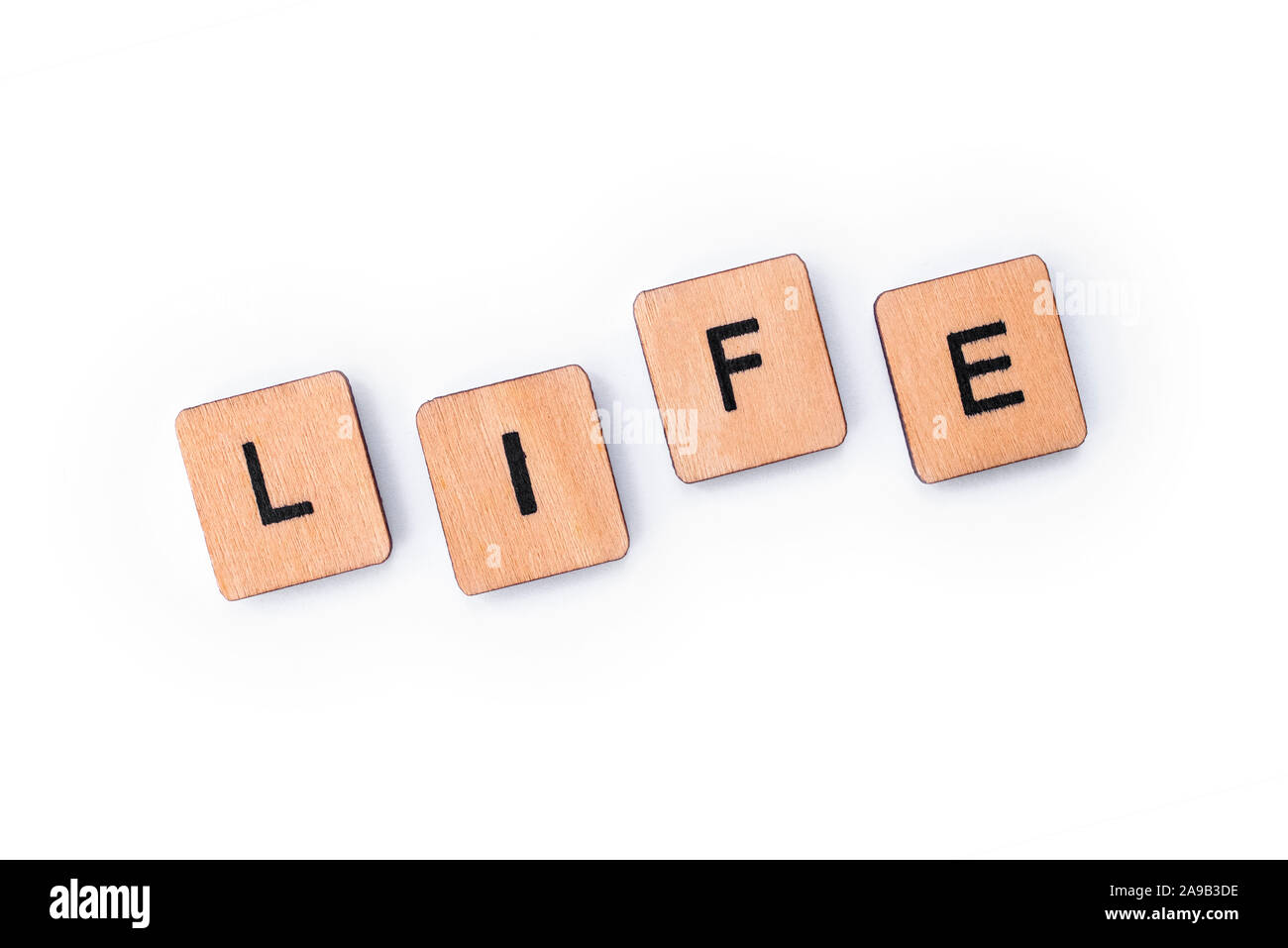 The word LIFE, spelt with wooden letter tiles Stock Photo - Alamy