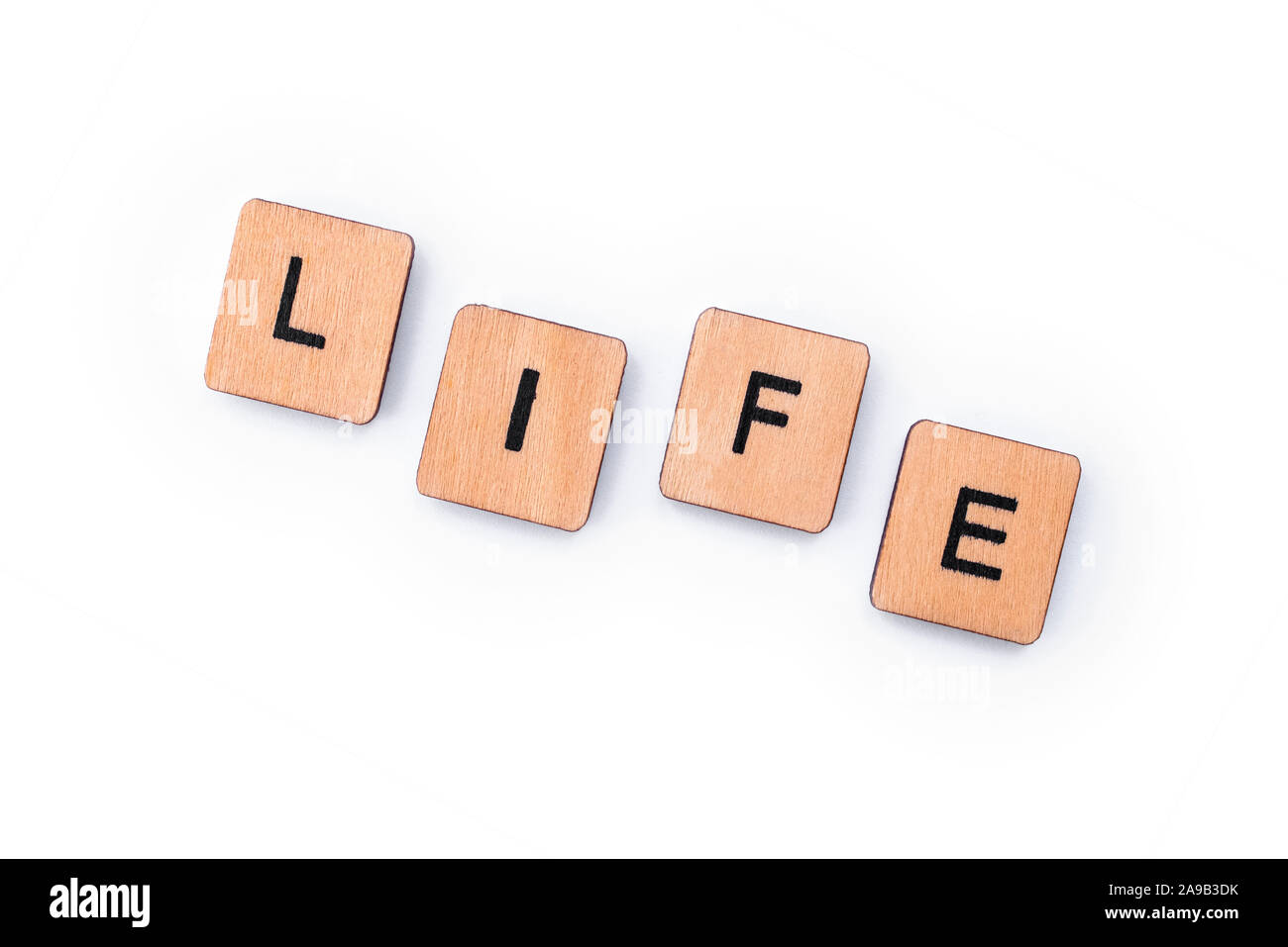 The word LIFE, spelt with wooden letter tiles Stock Photo - Alamy