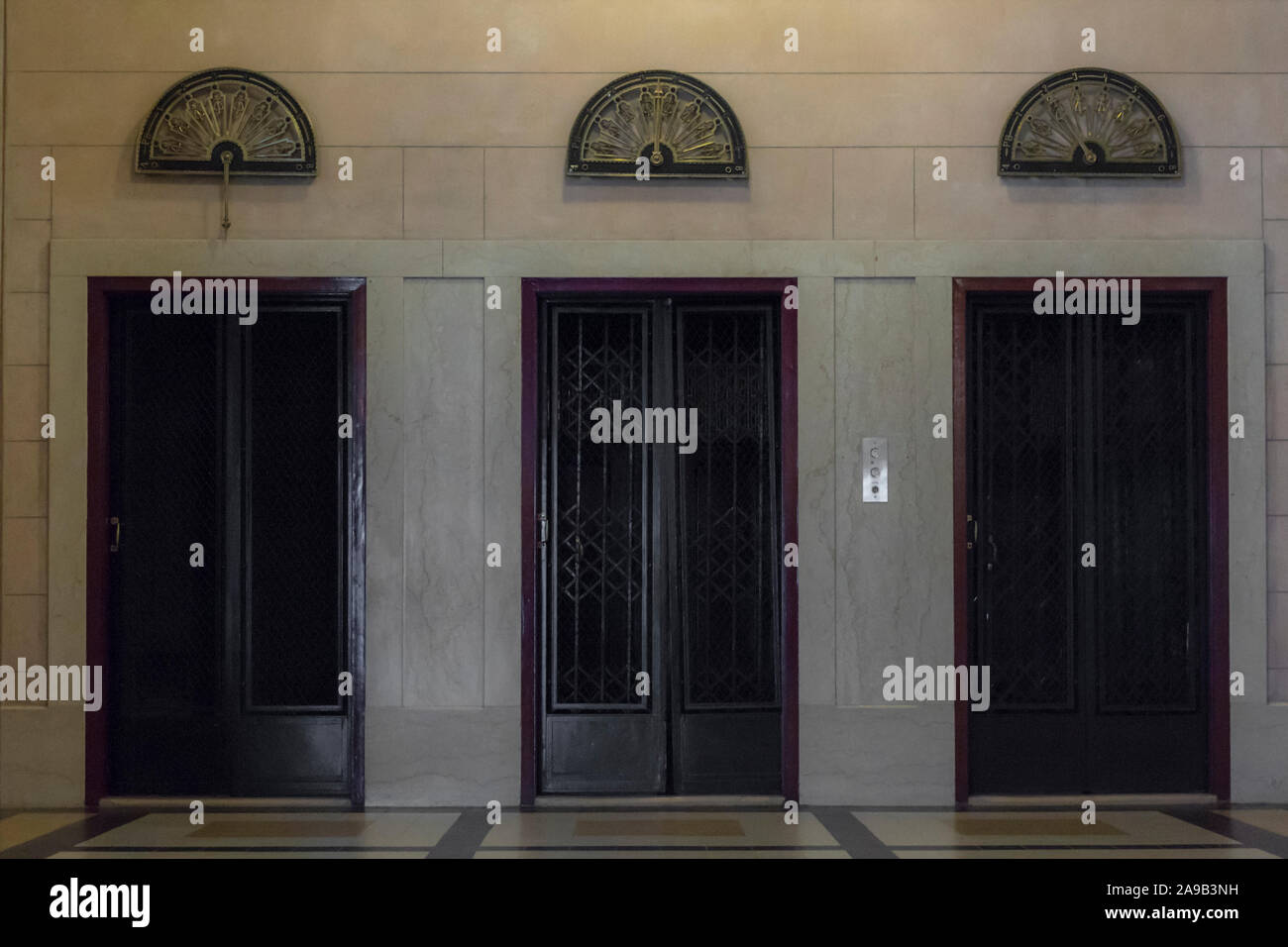Public elevator from early 1900s. Bronze and iron give it a vintage ...