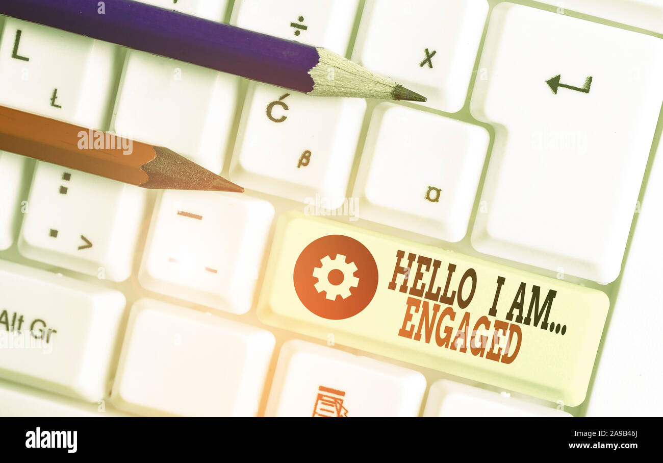 Handwriting text Hello I Am Engaged. Conceptual photo He gave the ring ...