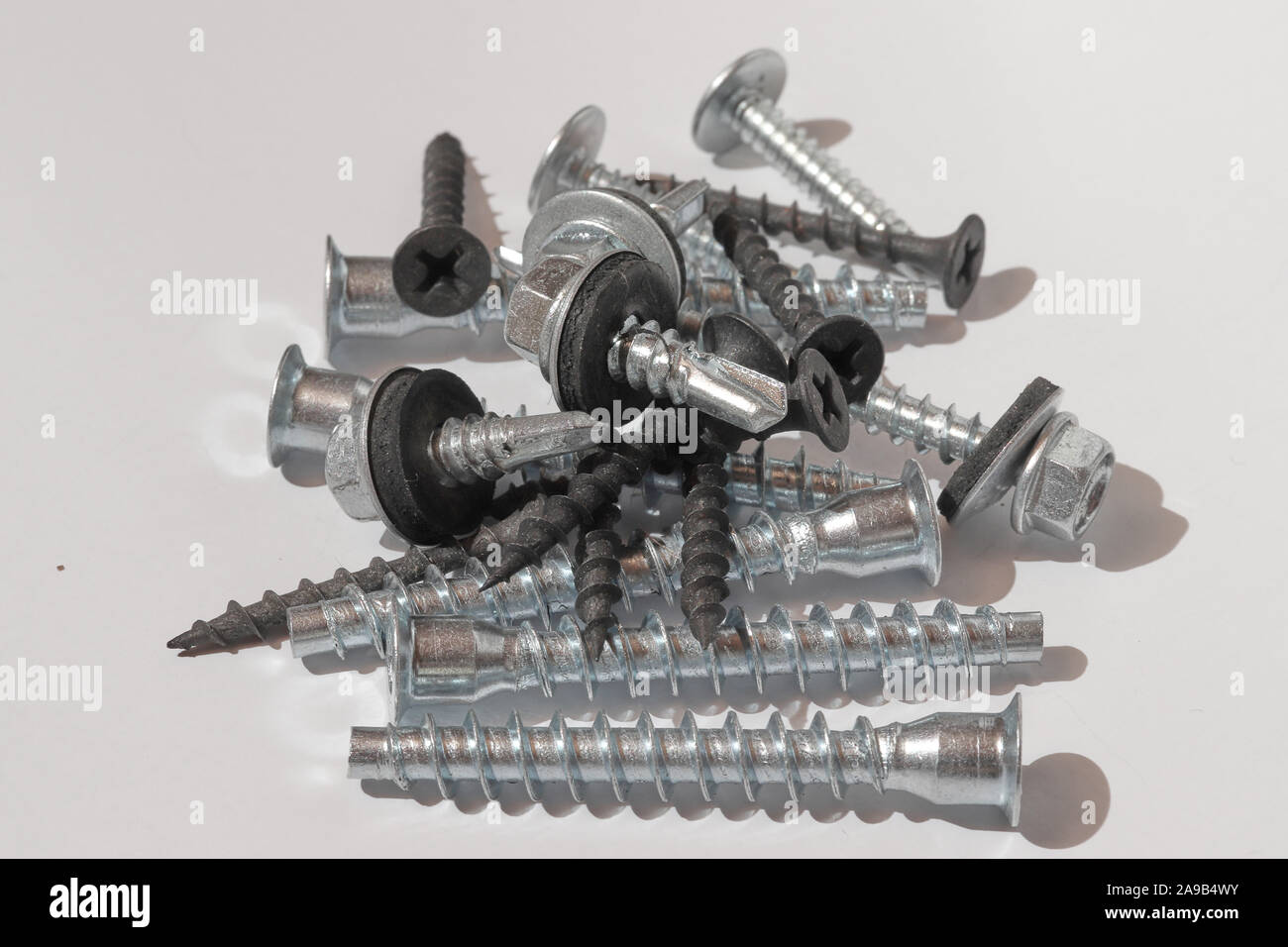 galvanized screws and screws for repair work Stock Photo - Alamy