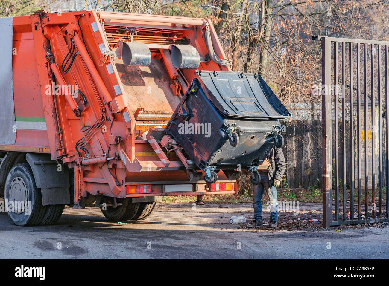 Process of garbage loading to the garbage truck Stock Photo - Alamy