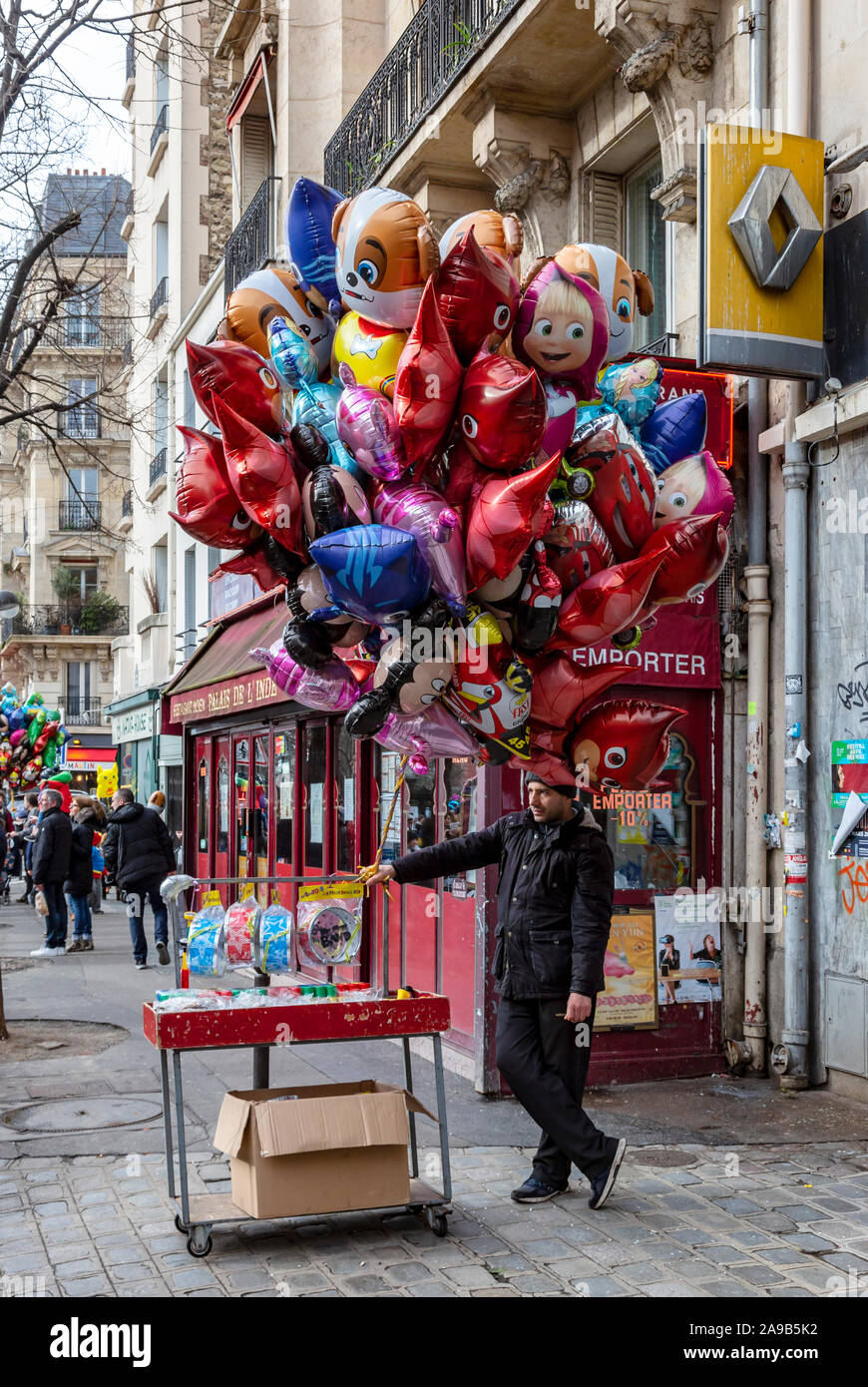 Paris, France - February 11,2018: Image of a street stand with balloons ...