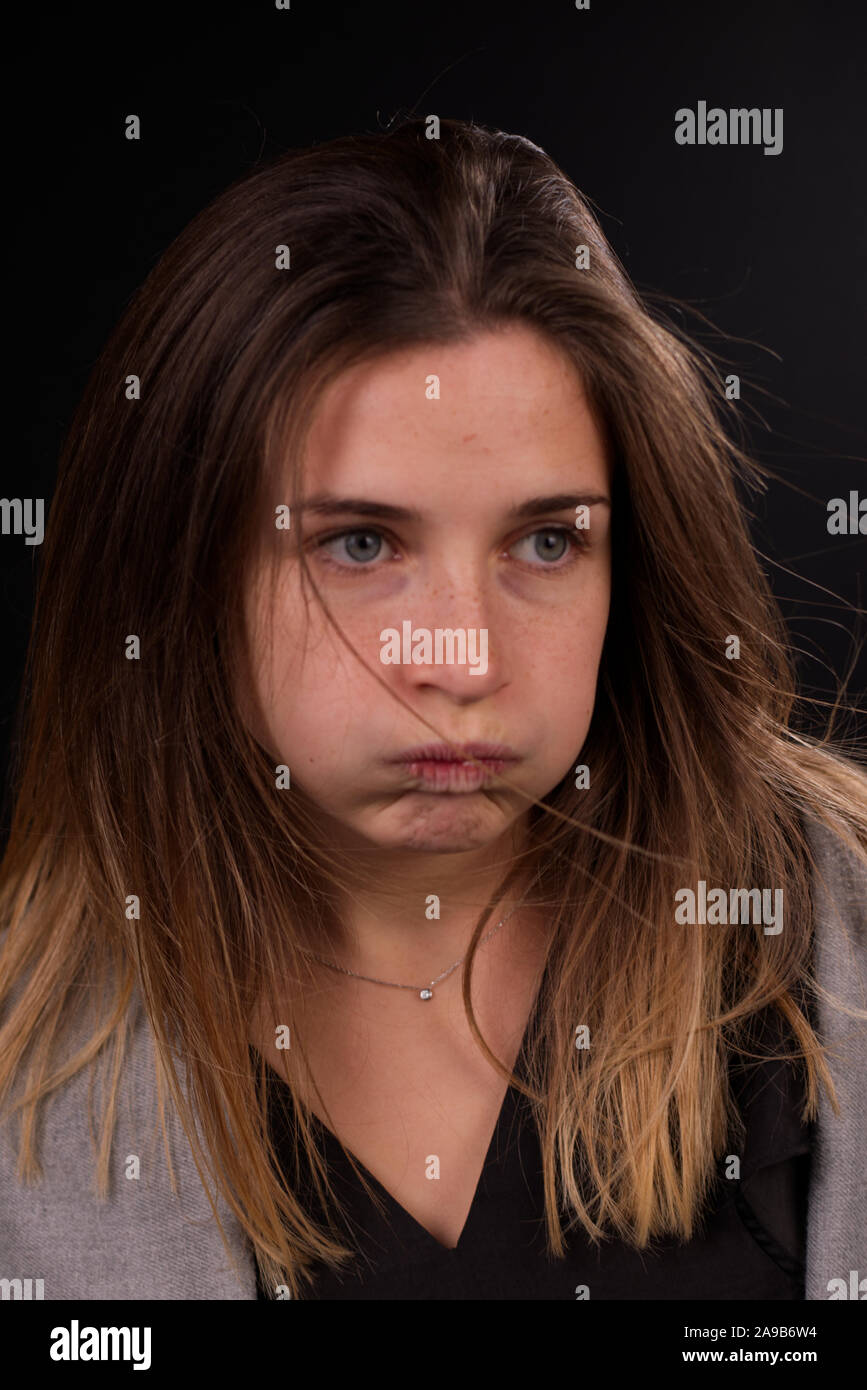 Disappointed young blond teen model hi-res stock photography and images ...