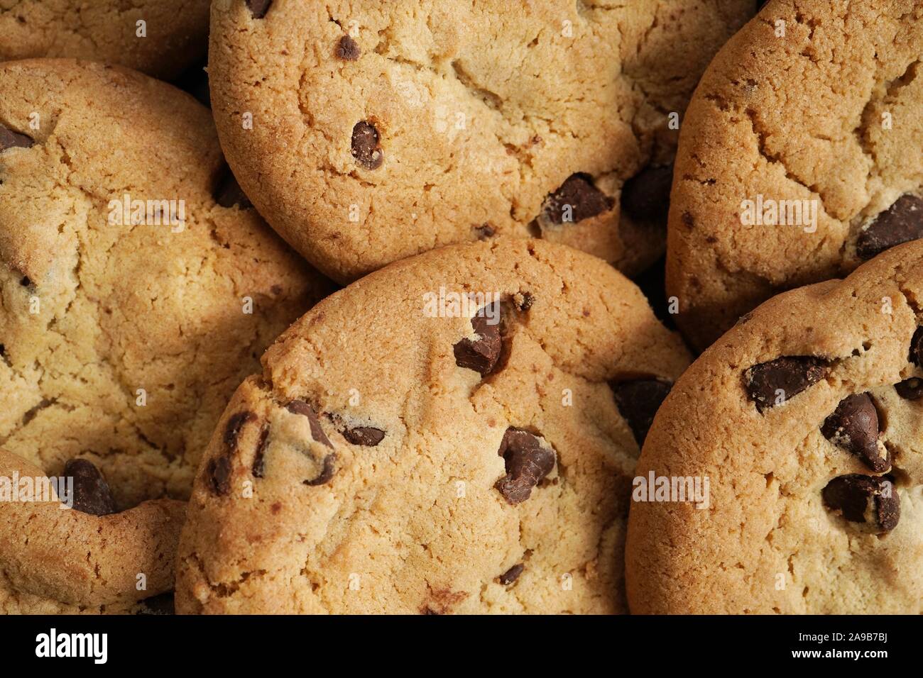 Chocolate chip cookies close up background Stock Photo - Alamy