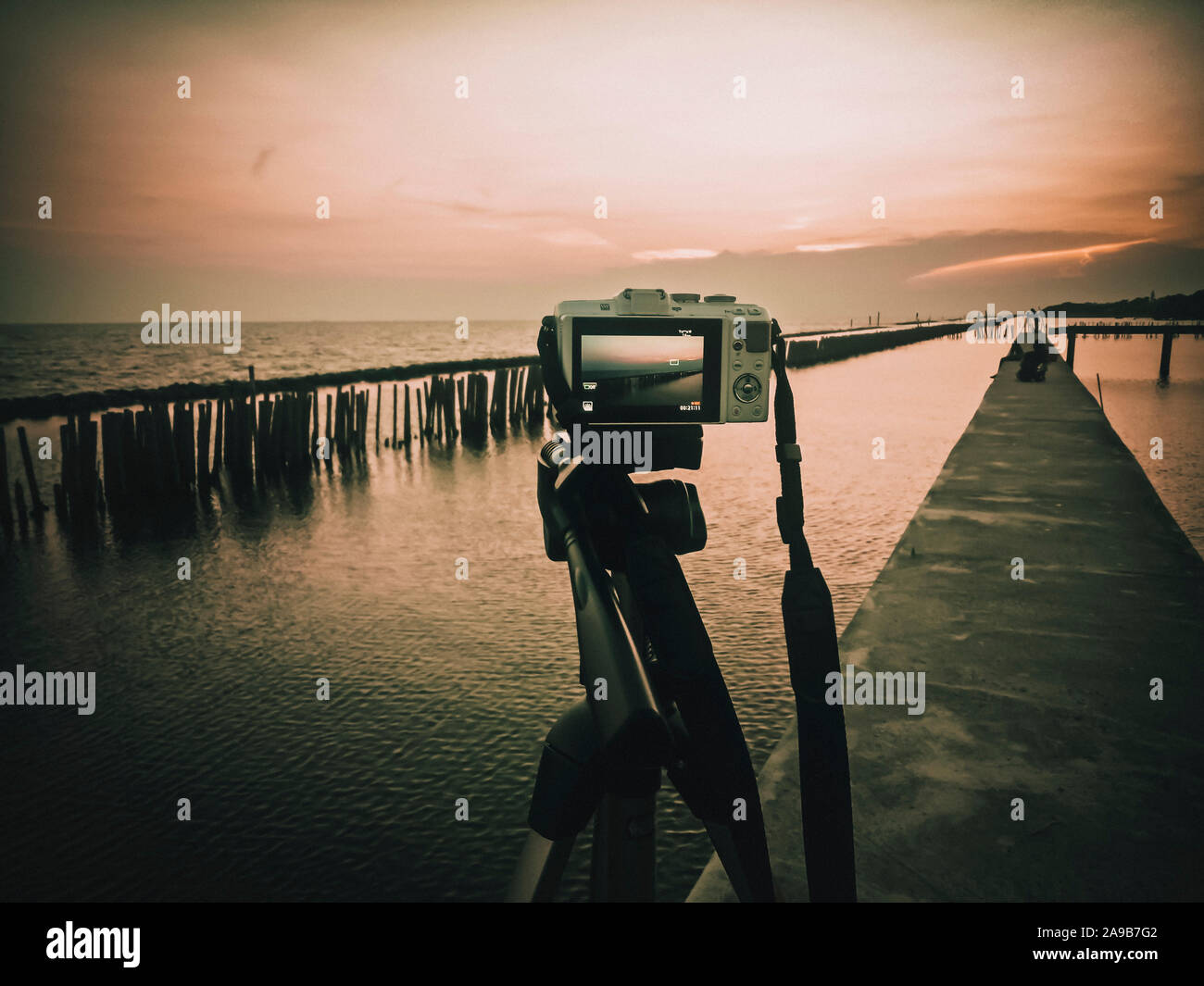Camera on a tripod . taking pictures of the beautiful moments during ...