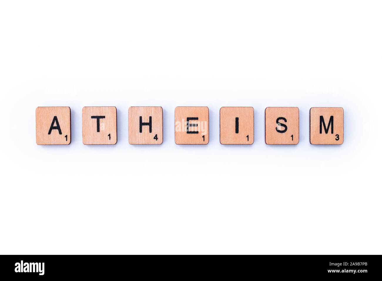 London, UK - February 6th 2019: The word ATHEISM, spelt with wooden ...