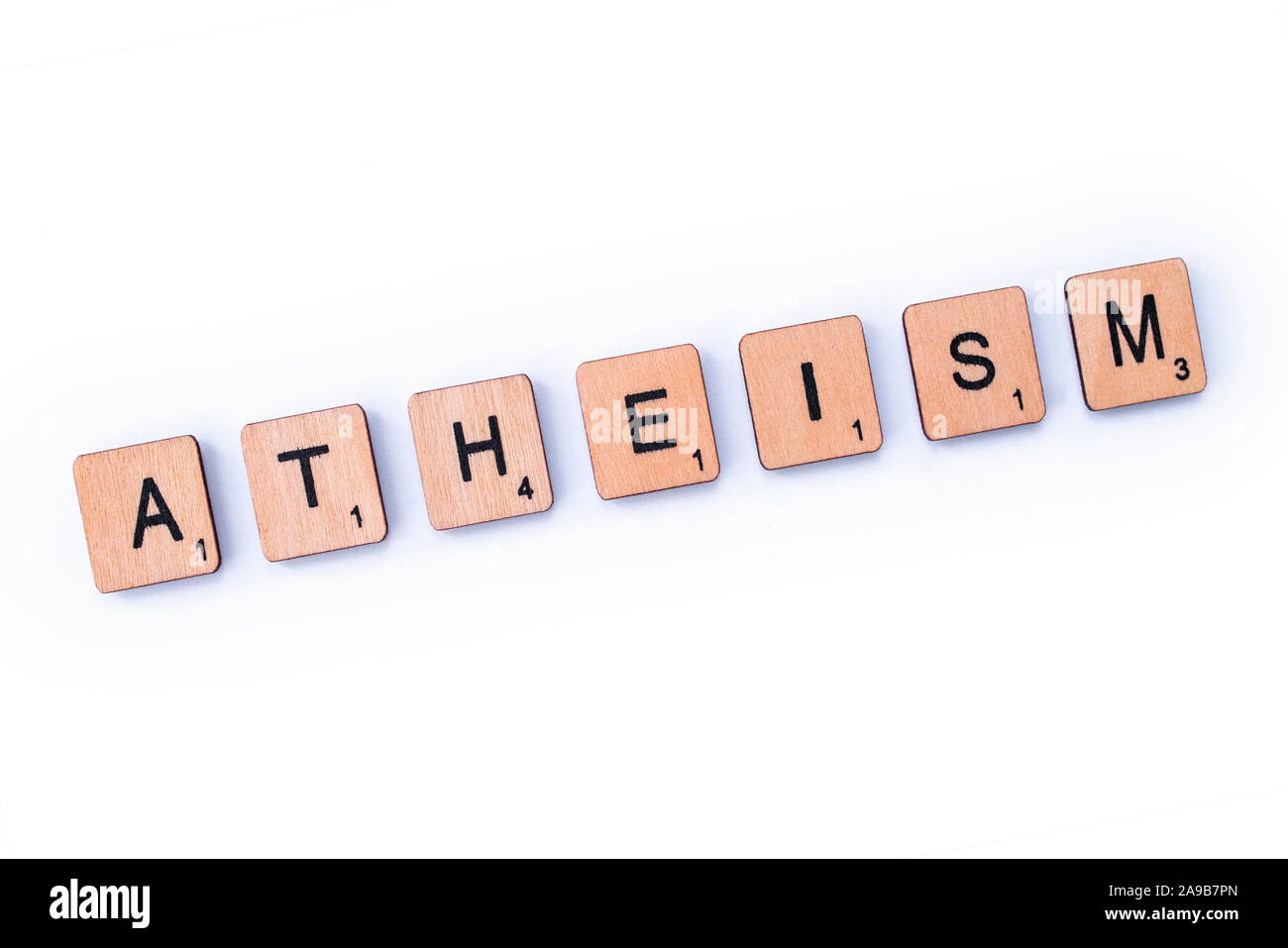 London, UK - February 6th 2019: The word ATHEISM, spelt with wooden ...