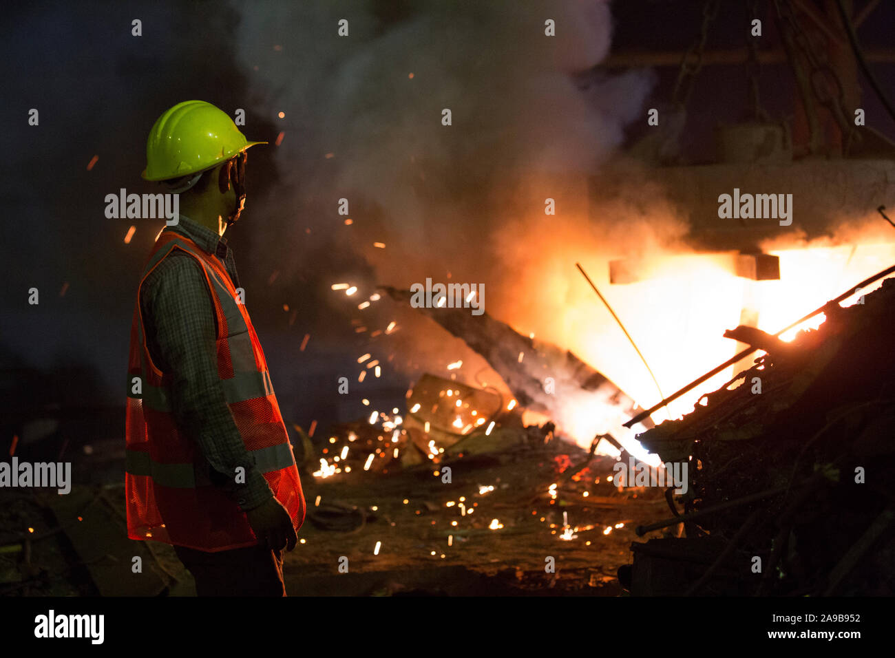 Bangladesh – May 19, 2015: From metal scrap to iron rod making steel ...
