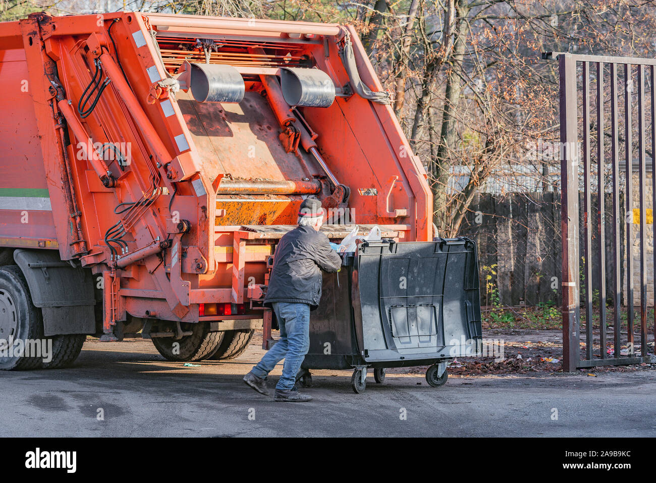 Process of garbage loading to the garbage truck Stock Photo - Alamy