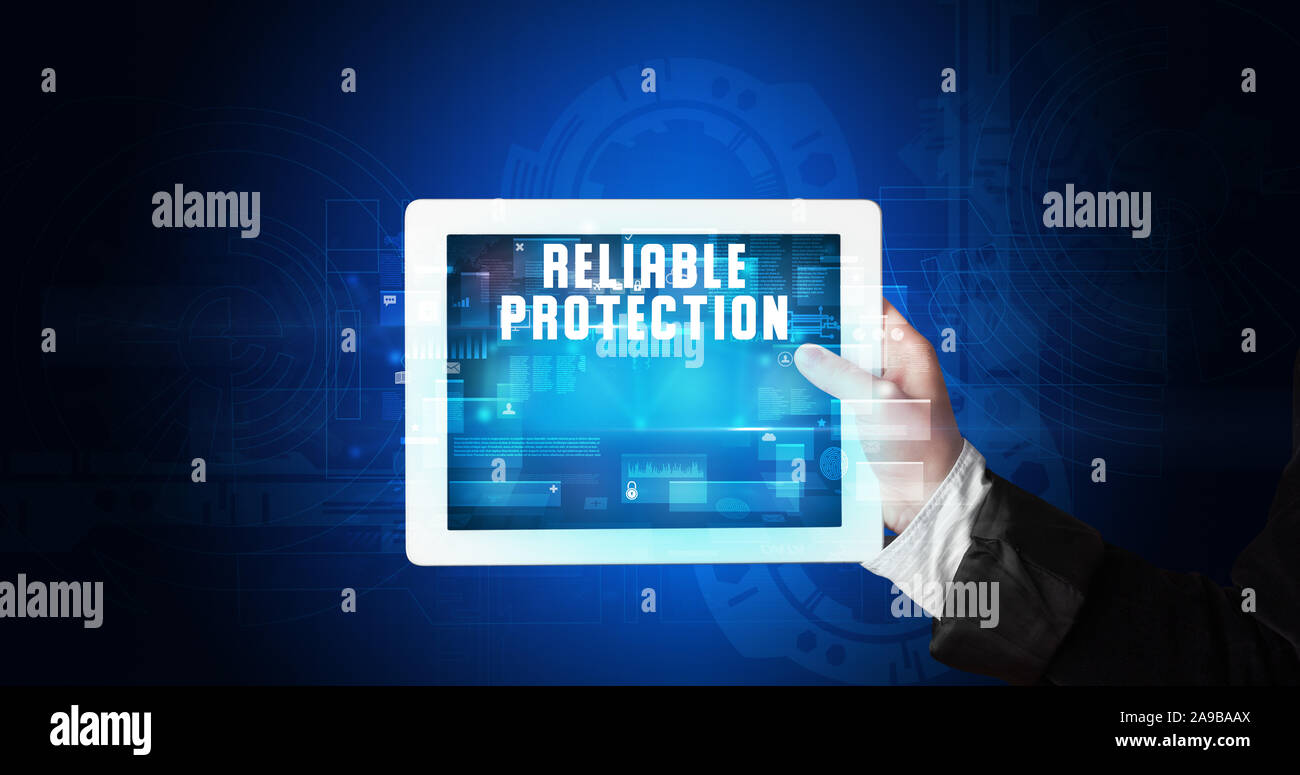 Young business person working on tablet and shows the digital sign ...