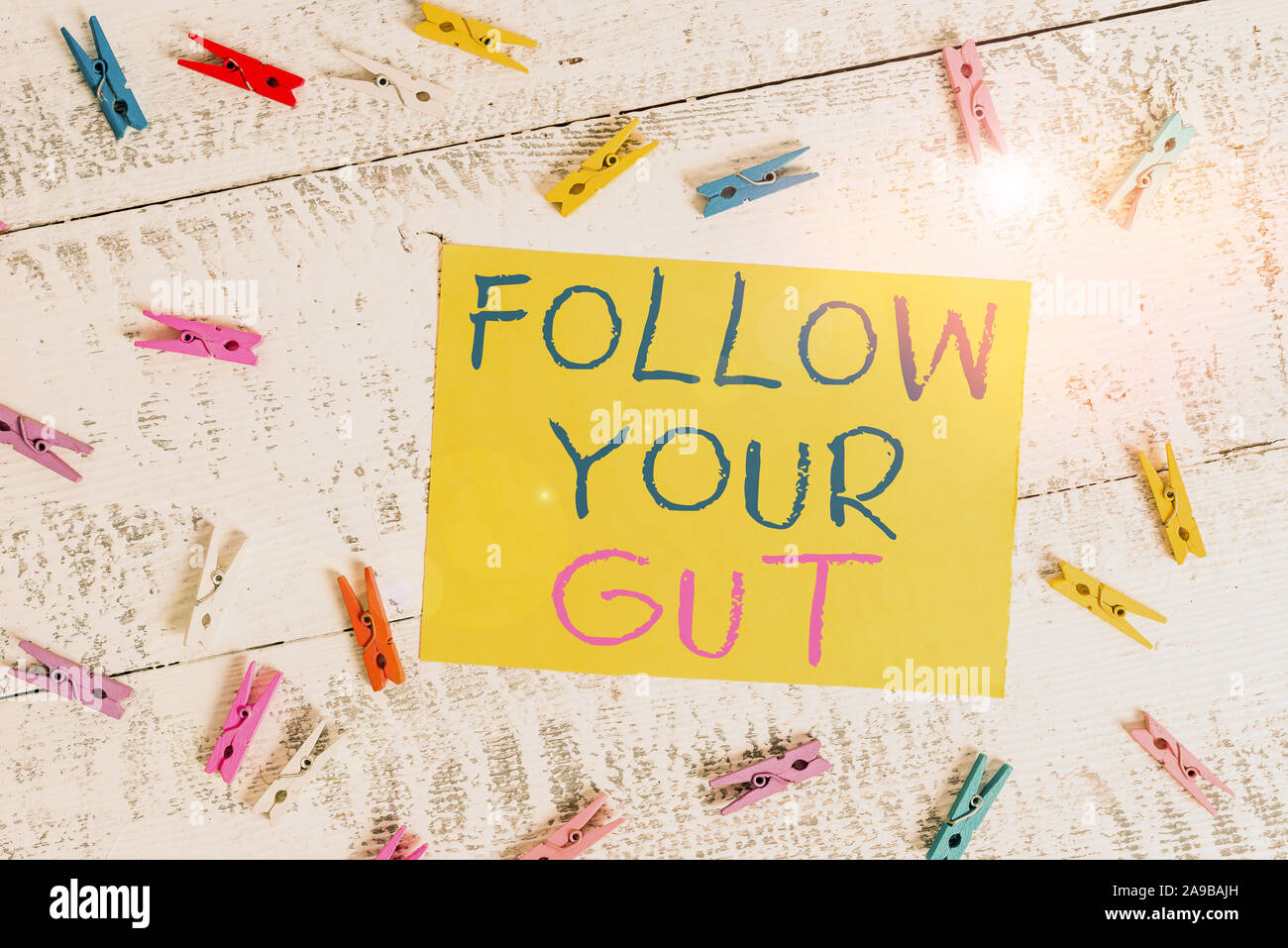 Conceptual hand writing showing Follow Your Gut. Concept meaning Listen ...
