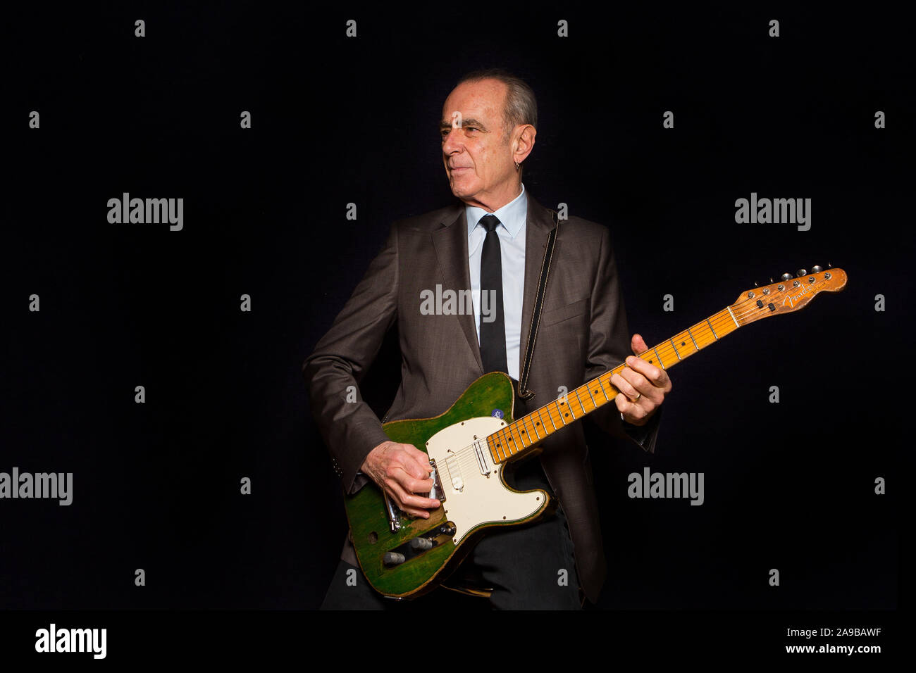 Status Quo frontman Francis Rossi OBE plays his green Fender Telecaster ...