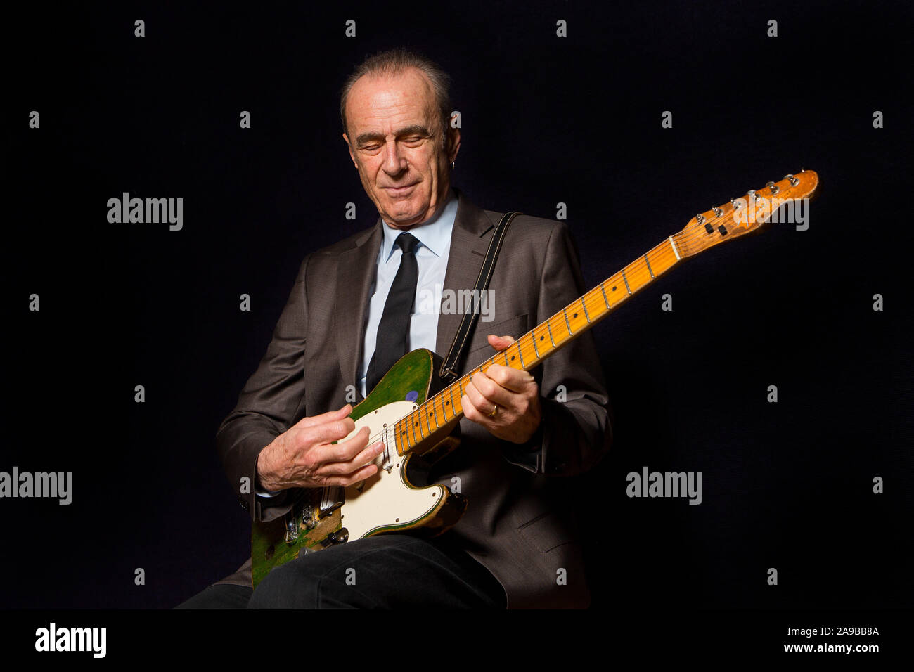 Status Quo frontman Francis Rossi OBE plays his green Fender Telecaster ...