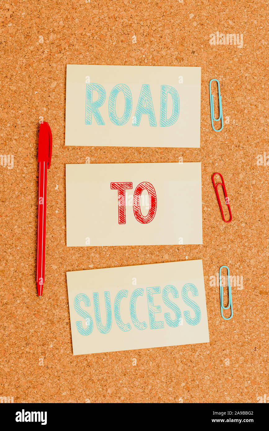 Writing note showing Road To Success. Business concept for studying ...