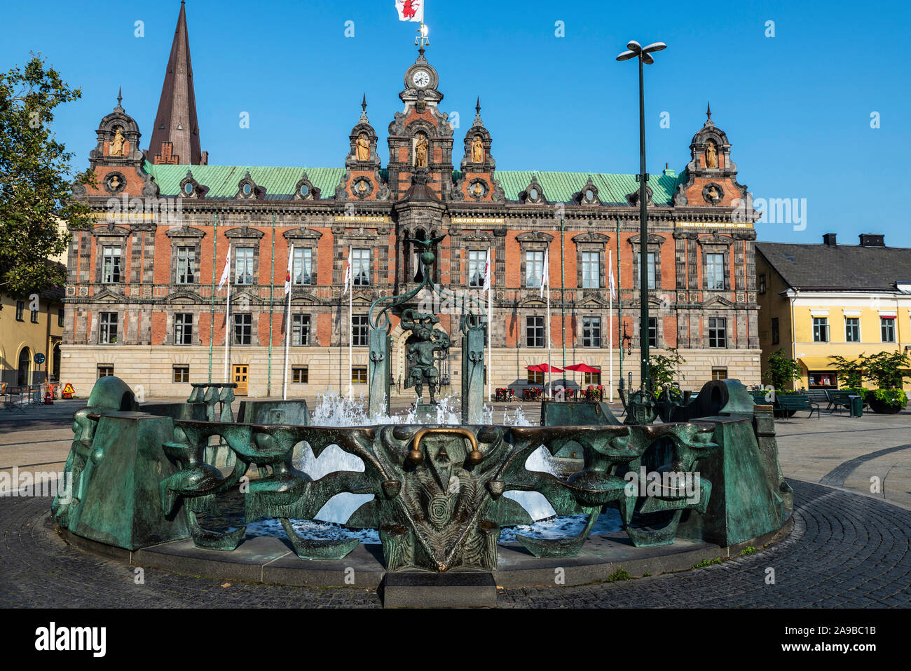 Fountain and the old classic Malmo City Hall in Stortorget, a large ...