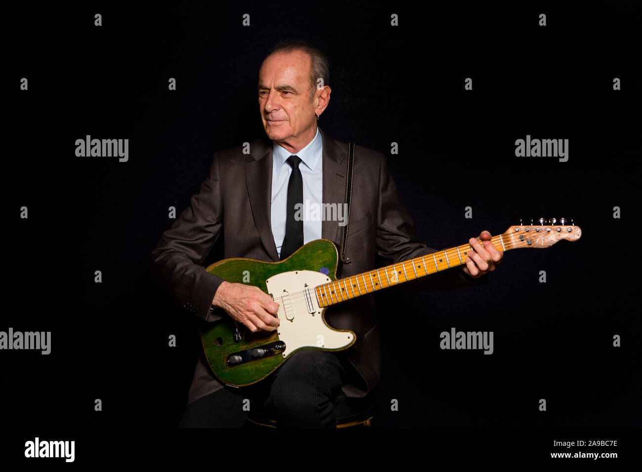 Status Quo frontman Francis Rossi OBE plays his green Fender Telecaster ...