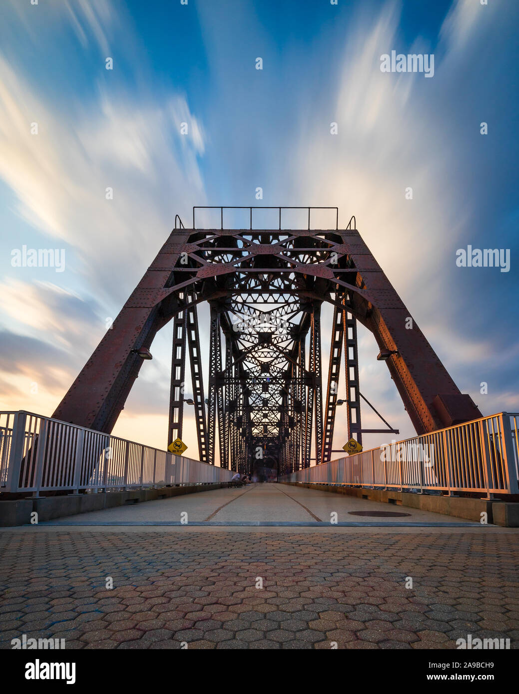 A long exposure of a Big Four Bridge in downtown Louisville, KY that ...