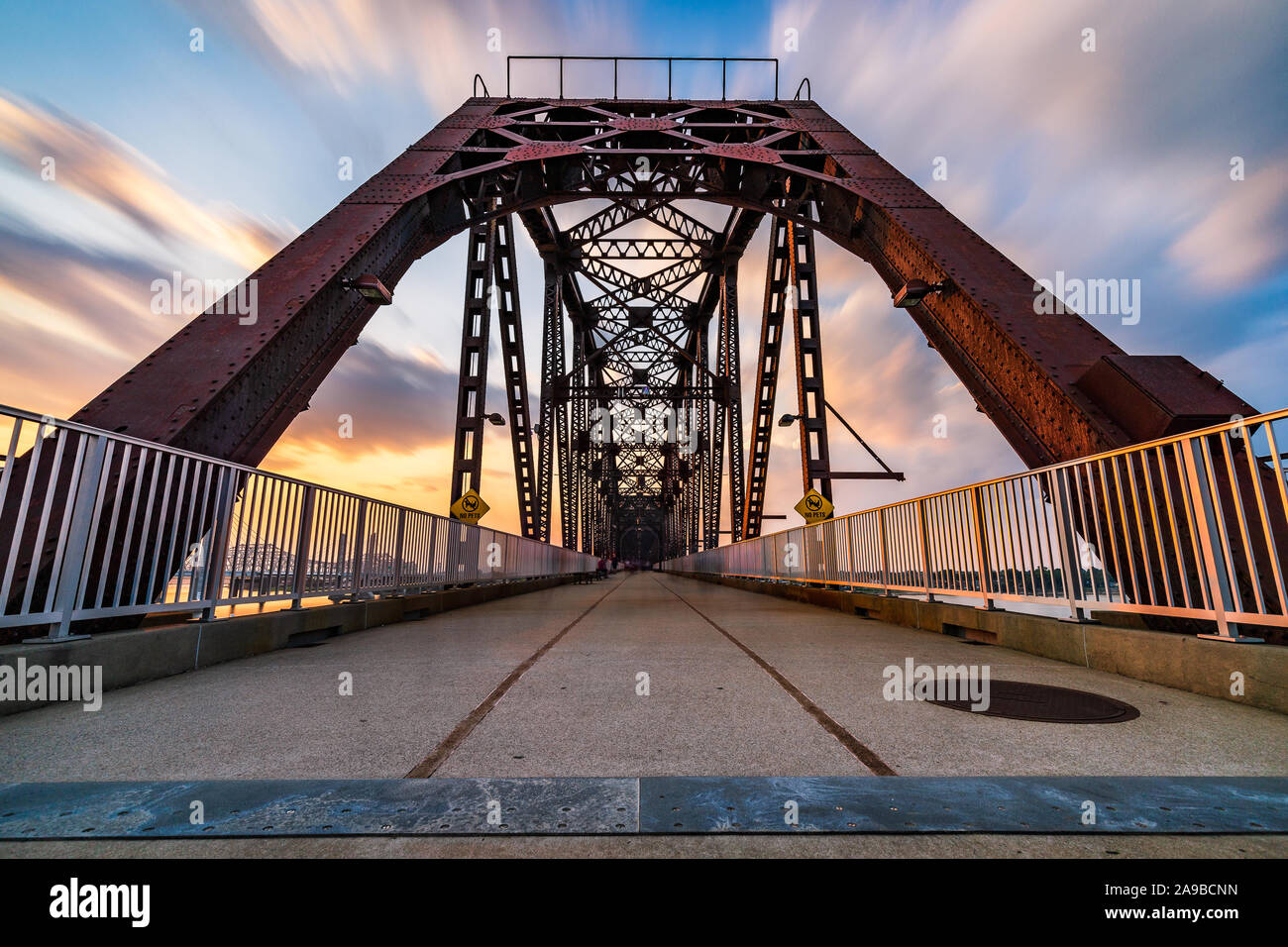 A long exposure of a Big Four Bridge in downtown Louisville, KY that ...