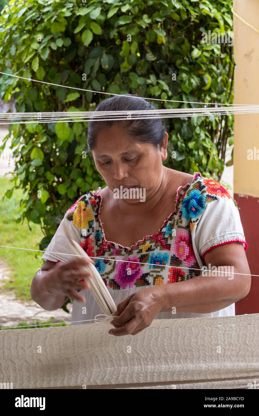YUCATAN, MEXICO. OCT 22 2017. Mayan woman working on hammock. Weaving ...