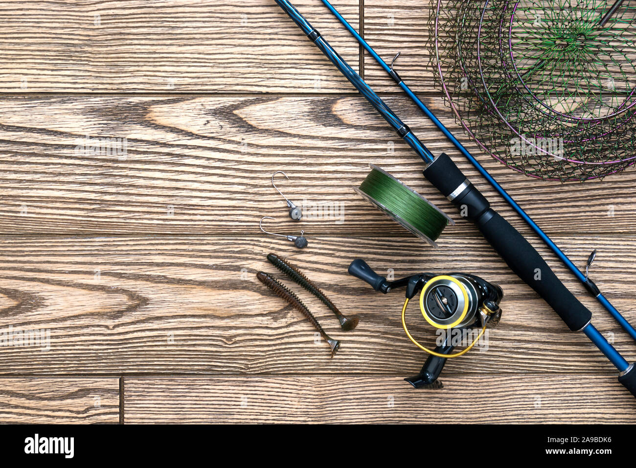Fishing background. tackle - fishing spinning, hooks and lures on ...