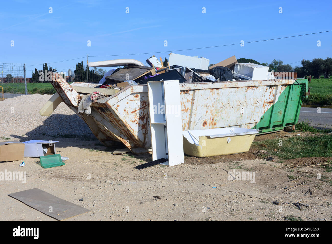 a garbage container of furniture and objects Stock Photo - Alamy