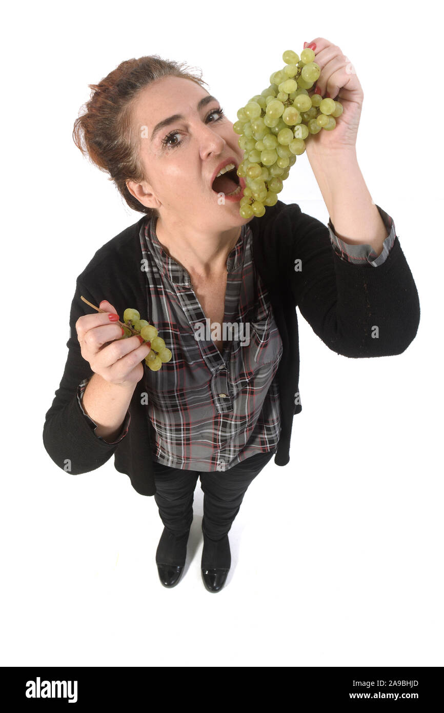 Bite the grape hi-res stock photography and images - Alamy