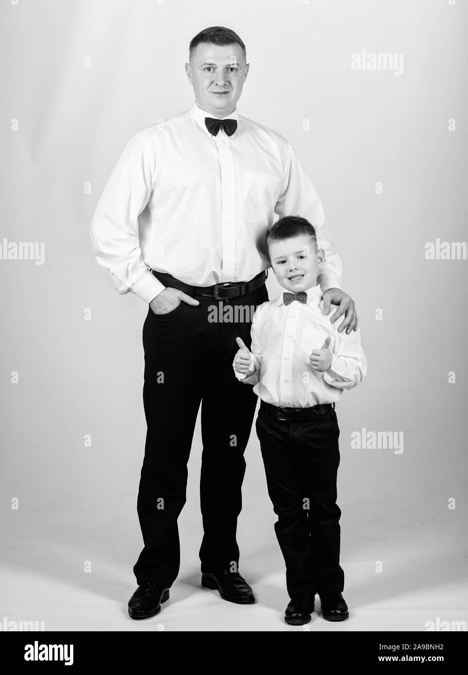 toffs father and son in formal suit. small boy with dad businessman ...