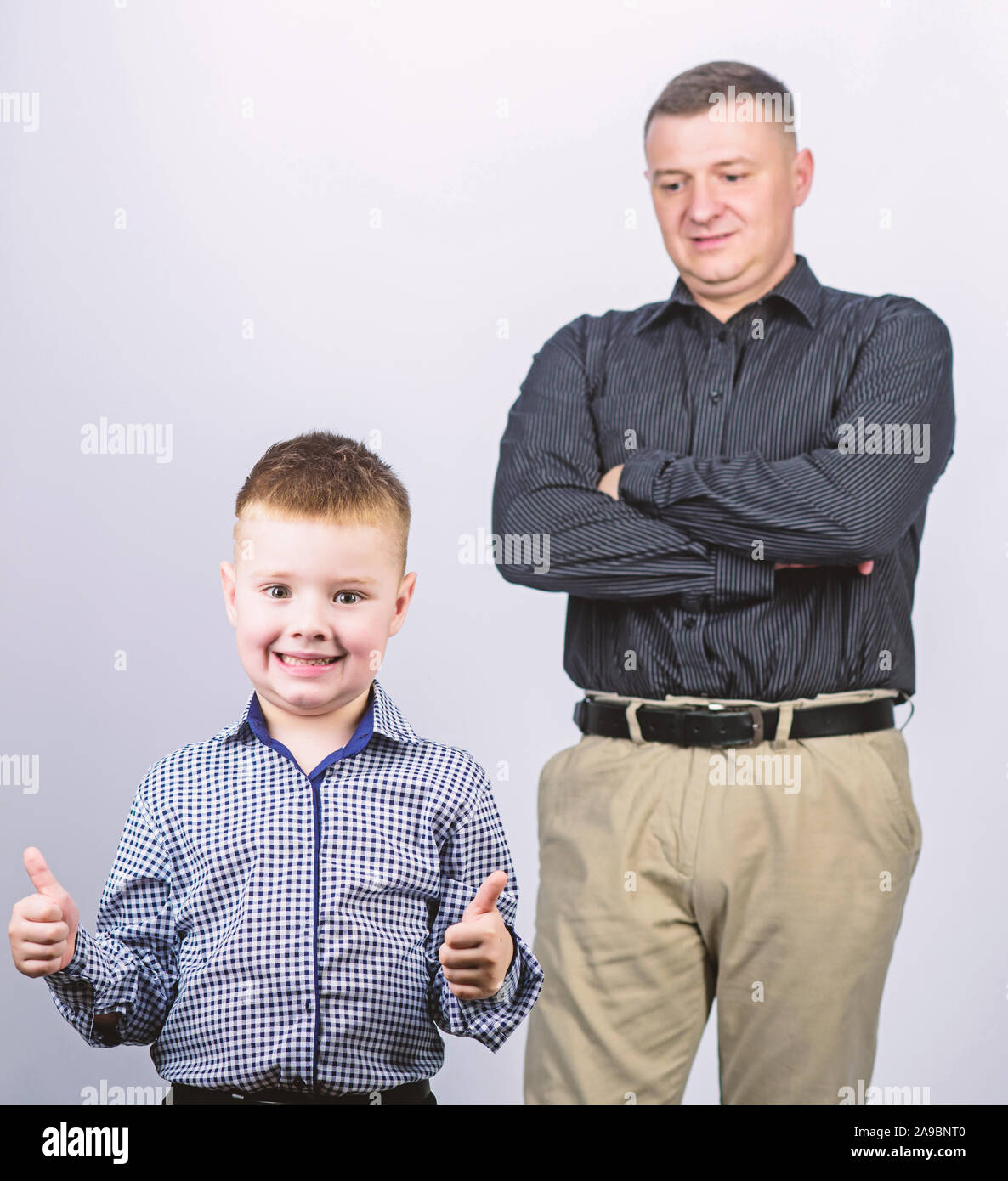 family day. happy child with father. business partner. father and son ...