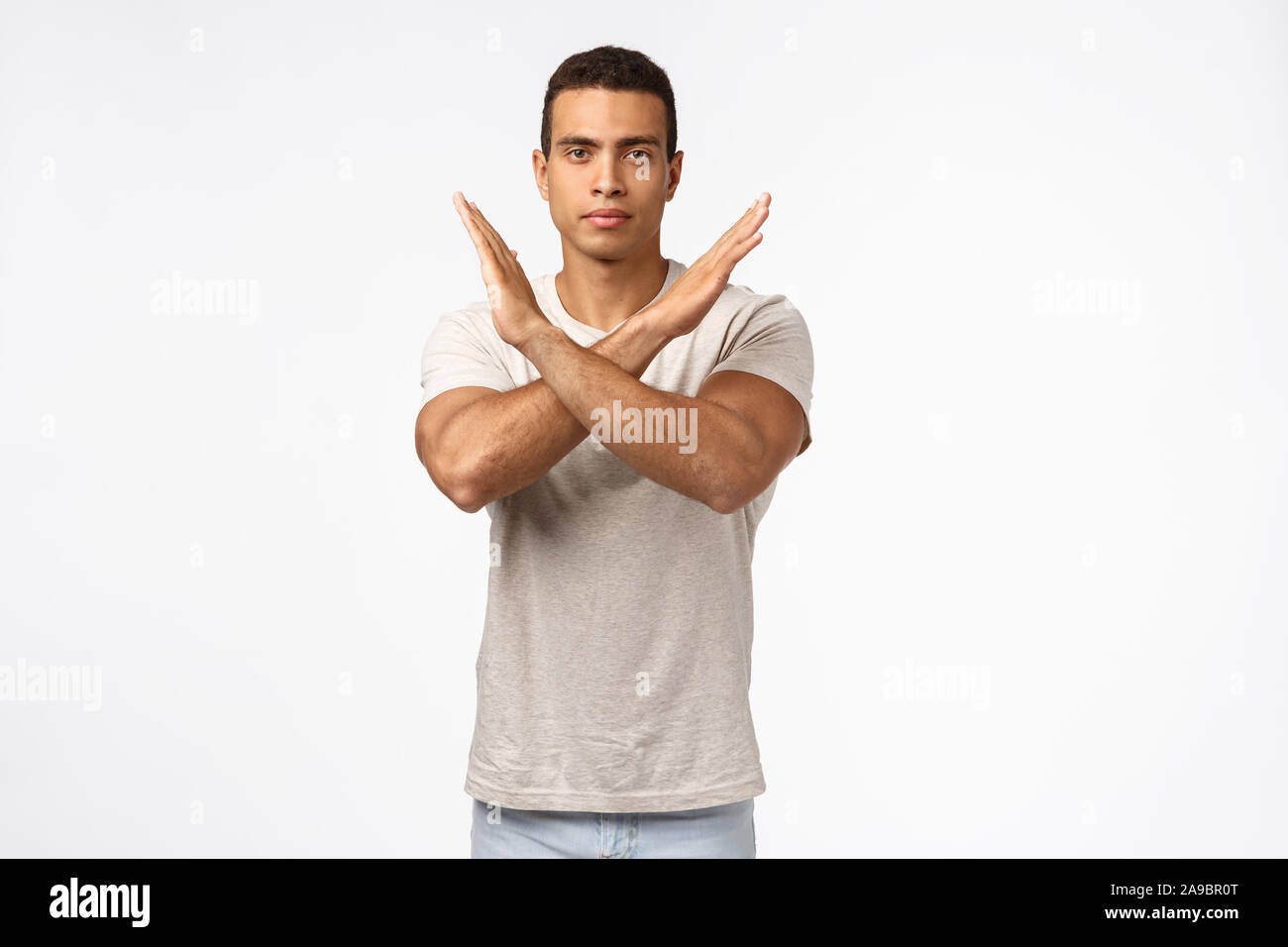 Time to stop. Serious-looking strong calm young masculine male athlete ...