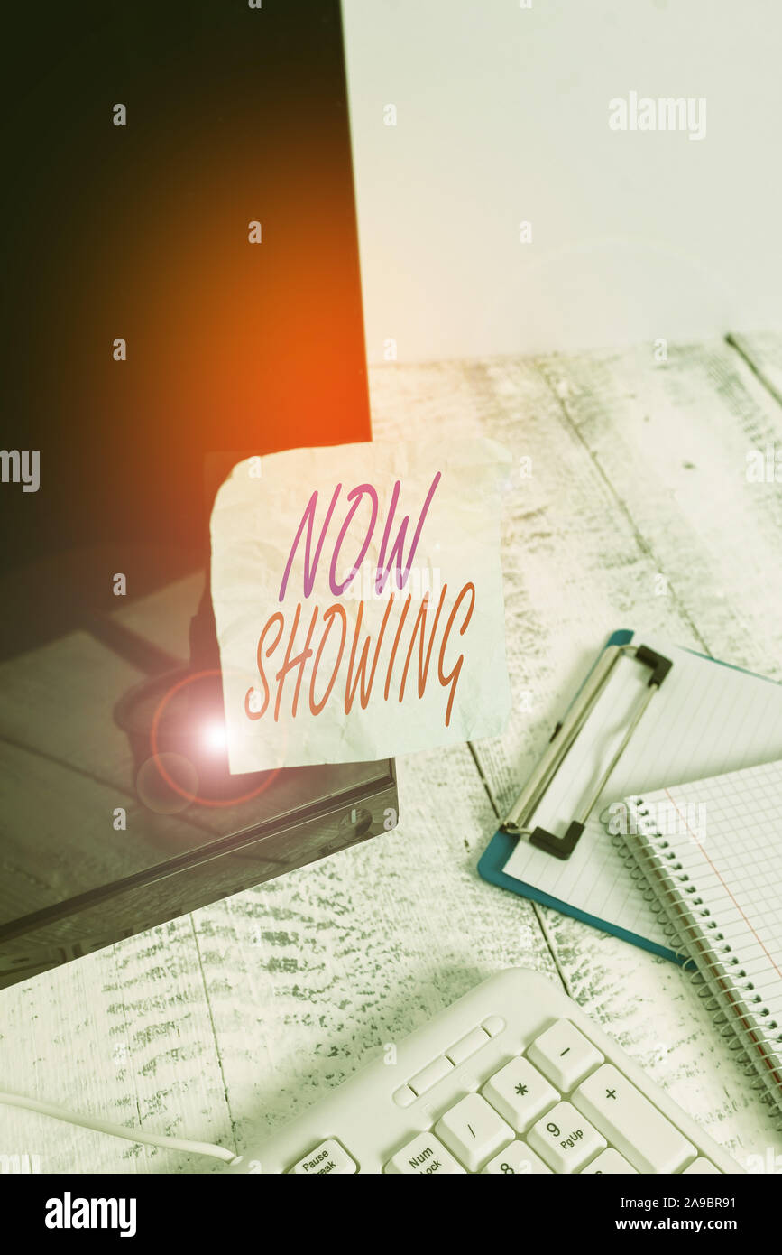 Conceptual hand writing showing Now Showing. Concept meaning ...