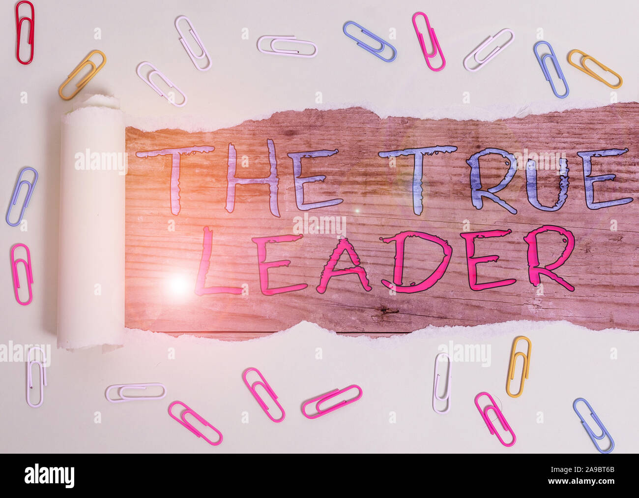 Writing note showing The True Leader. Business concept for one that ...