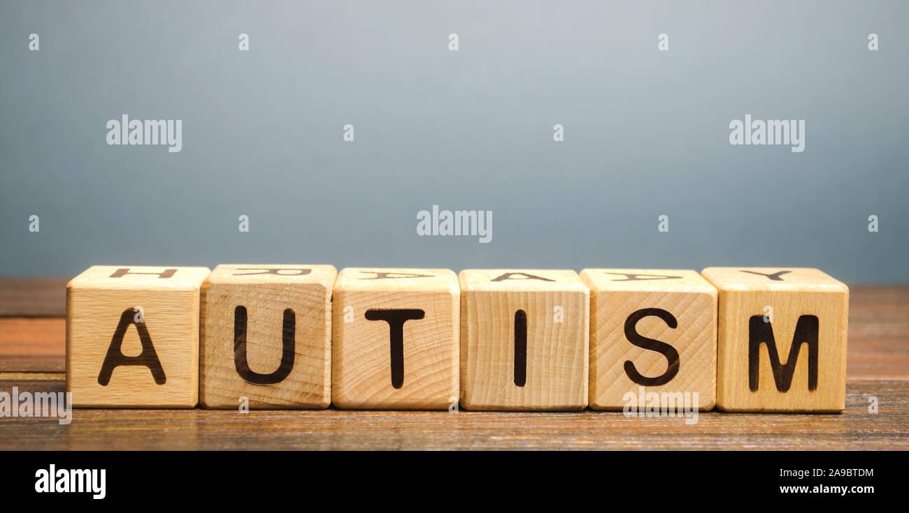 Wooden blocks with the word Autism. Neurological and developmental ...