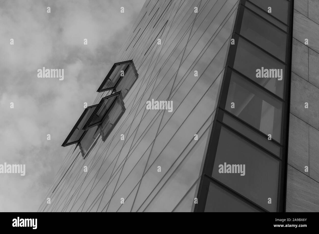 Skysraper with open windows. Sometimes little gesture changes the air ...