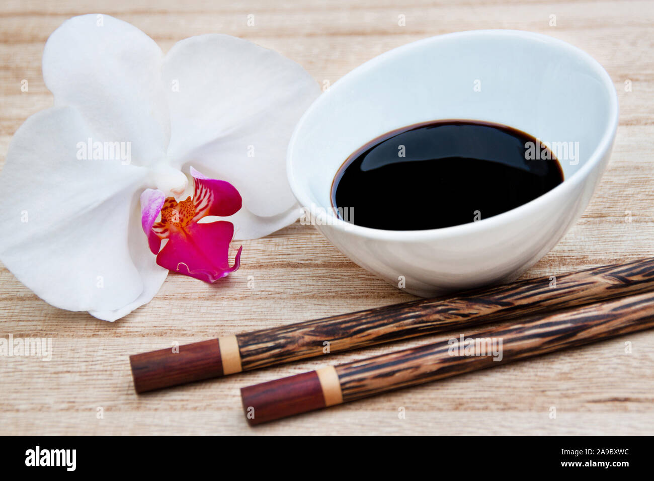 Soy sauce and table decorations Stock Photo - Alamy