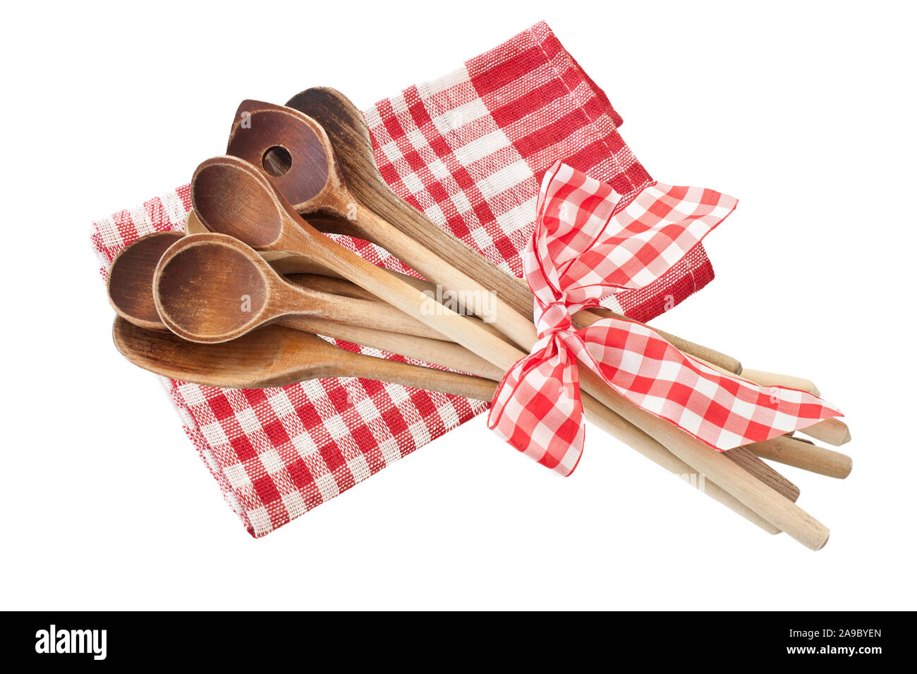 Wooden cooking spoons on white background Stock Photo - Alamy