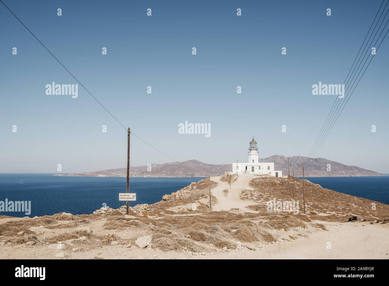 View of Armenistis Lighthouse in Mykonos, Greece, blue sky, selective ...