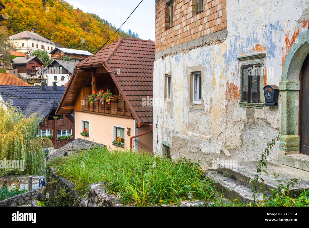 The village of Kropa, Slovenia with fall foliage color Stock Photo - Alamy